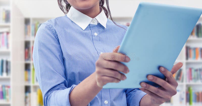 Womans Hands Holding Tablet in Library Stock Image - Image of flare ...