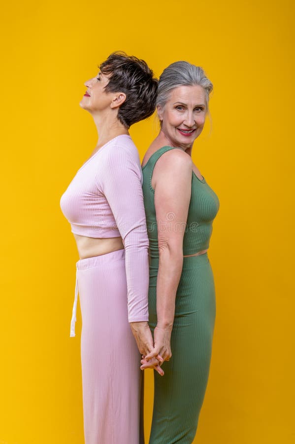 Active Senior Women Standing Close and Smiling Happily Stock Photo ...