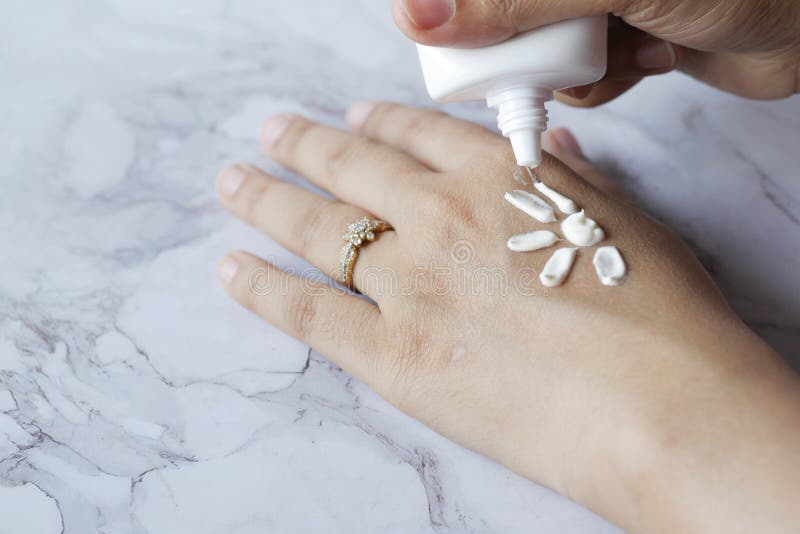 Women Apply Sunscreen Cream on Hand Stock Photo - Image of bottle ...