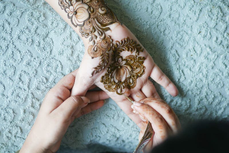 Women Applying Henna on Hand Stock Image - Image of care, treatment ...
