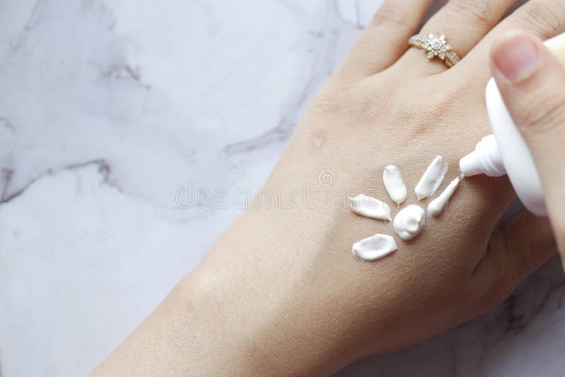 Women Applying Sunscreen Cream on Hand Stock Image - Image of ...