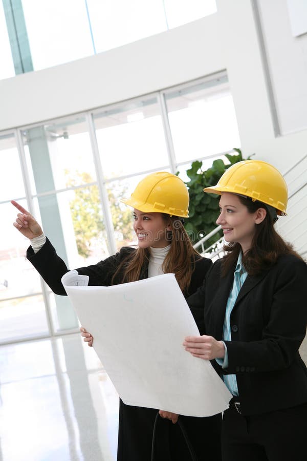 Pretty Women Architects on Construction Site Stock Photo - Image of ...