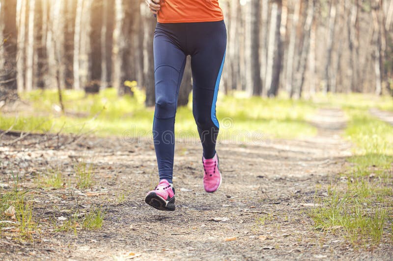 Women Athlete Running through the Woods. Stock Image - Image of shoes ...