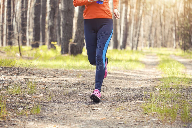Women Athlete Running through the Woods. Stock Photo - Image of track ...