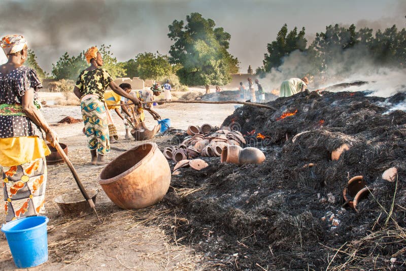 Women Bake the Clay Pots in a Big Fire. Editorial Photo - Image of work ...