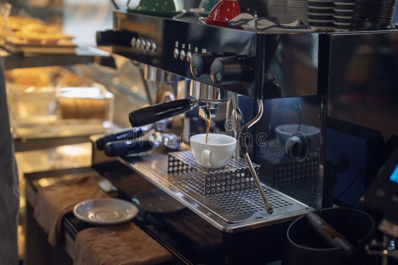 Women Barista in an Apron Making Coffee in a Coffee Shop Stock Photo ...