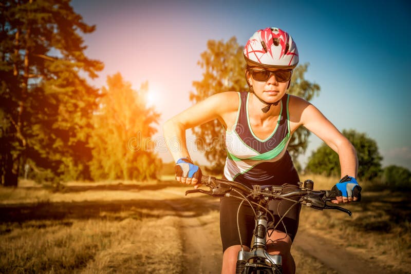 Women on bike stock image. Image of adult, caucasian - 50282567