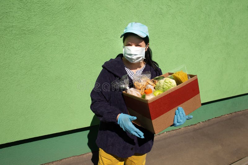 Women with a Box of Food, Help and Donation of Food Stock Photo - Image ...