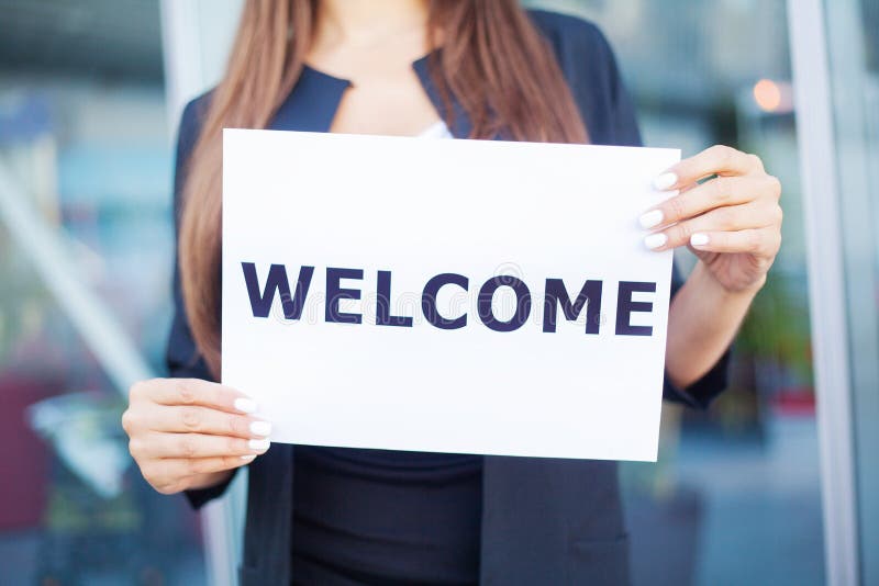 Women Business with the Poster with Welcome Message Stock Photo - Image ...