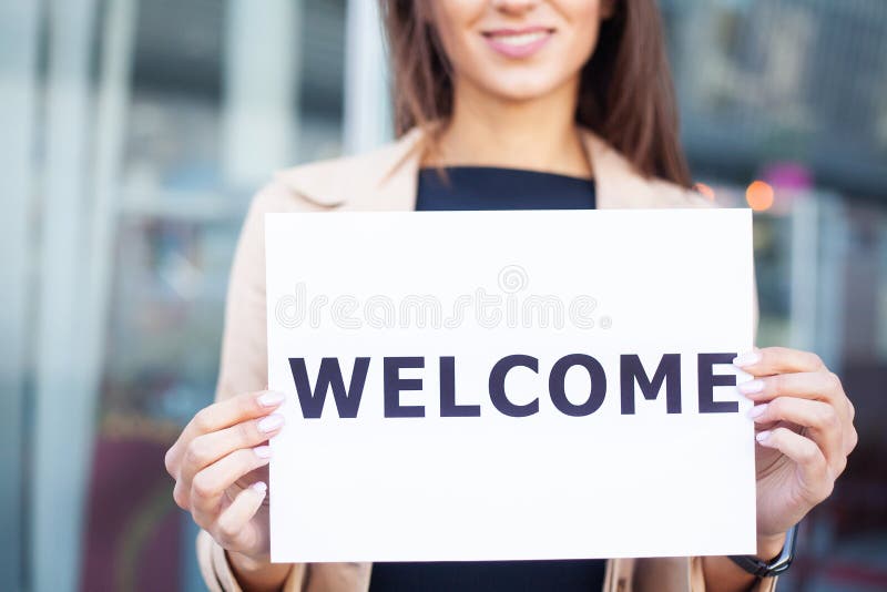 Women Business with the Poster with Welcome Message Stock Photo - Image ...