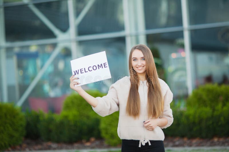 Women Business with the Poster with Welcome Message Stock Image - Image ...