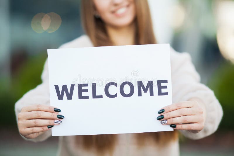 Women Business with the Poster with Welcome Message Stock Image - Image ...
