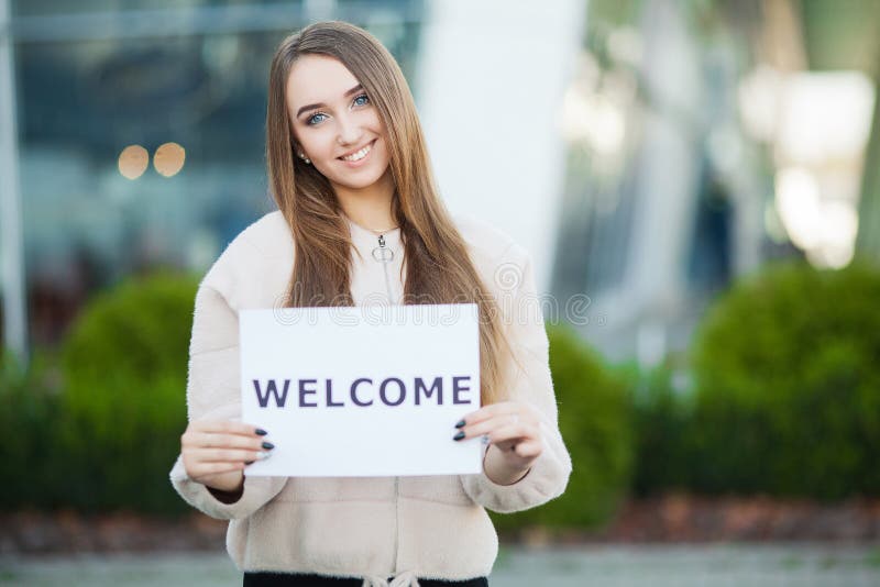 Women Business with the Poster with Welcome Message Stock Image - Image ...