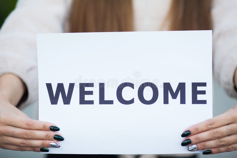Women Business with the Poster with Welcome Message Stock Image - Image ...