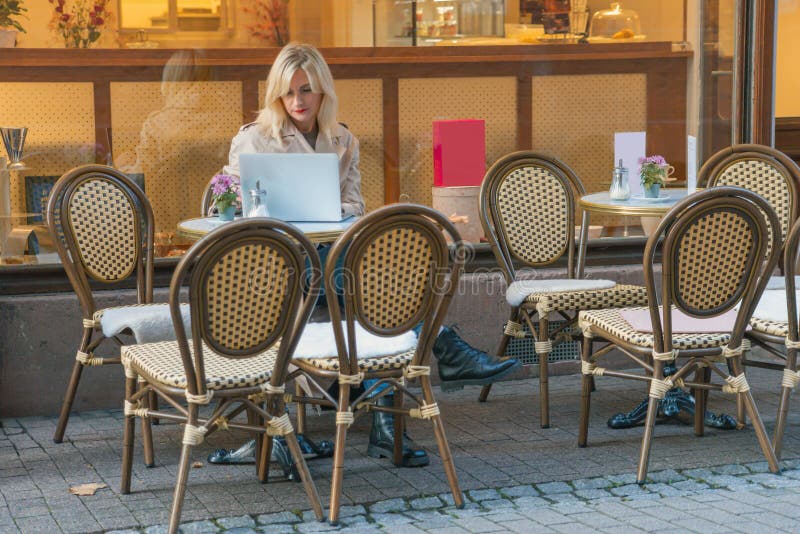 Women in a Cafe with a Laptop, Business and Learning Concept Stock ...