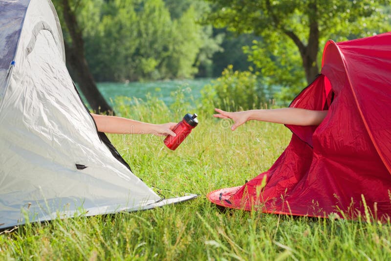 Women camping stock image. Image of people, drink, grass - 9620111