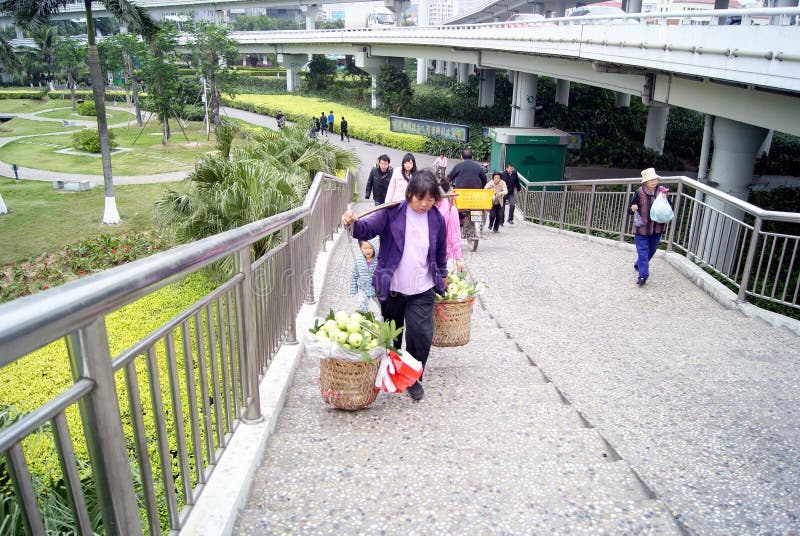 Women carry fruits editorial stock photo. Image of products - 22407333