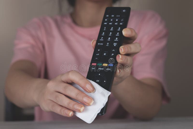 Woman hand remote control stock photo. Image of removal - 178658844