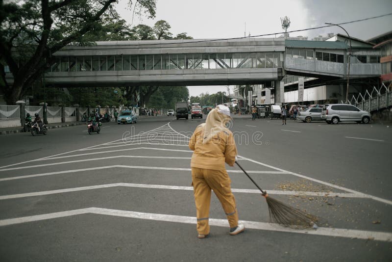 Women Cleaning in the Street Editorial Stock Image - Image of street ...