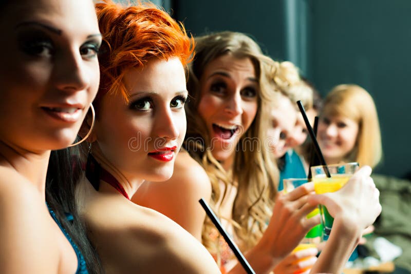 Women in Club or Disco Drinking Cocktails Stock Image - Image of ...