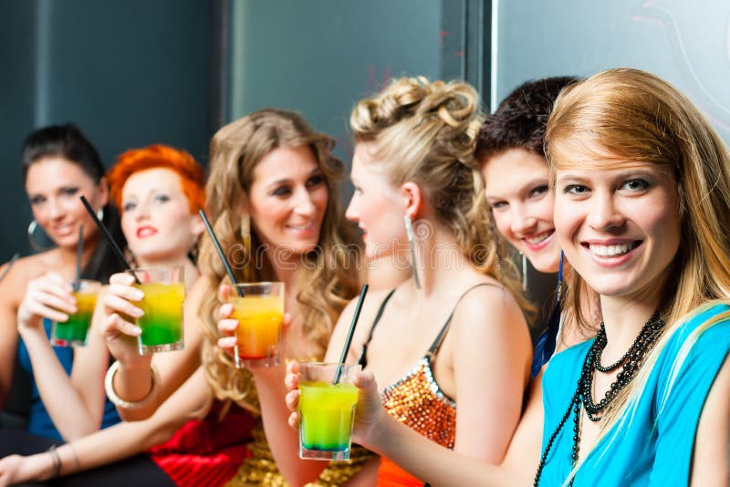 Women in Club or Disco Drinking Cocktails Stock Image - Image of ...