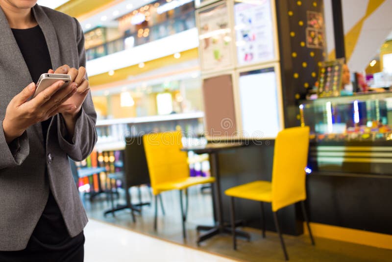 Women in Coffee Shop Using Mobile Phone Stock Photo - Image of mobile ...