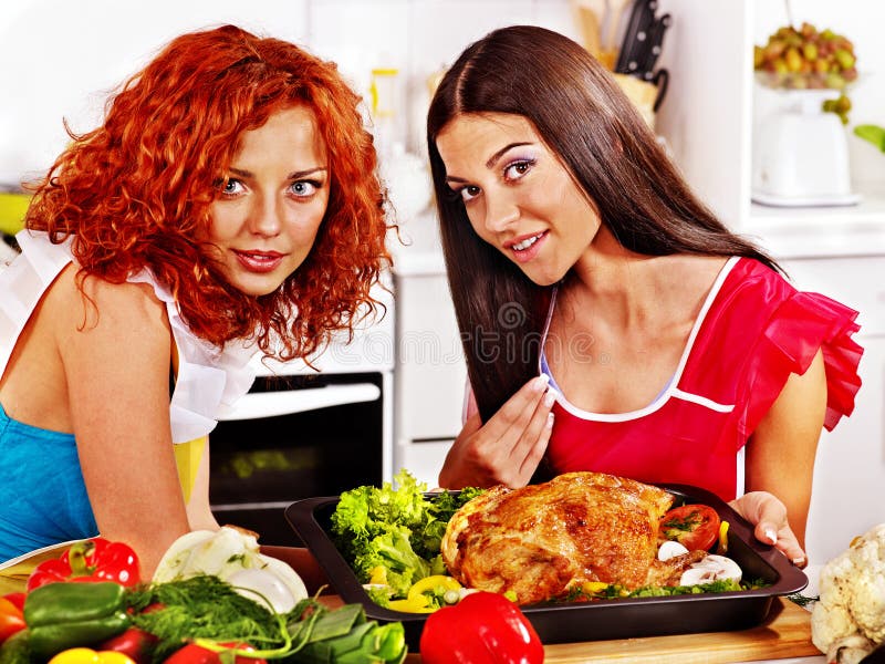 Women Cooking Chicken at Kitchen. Stock Photo - Image of housewife ...