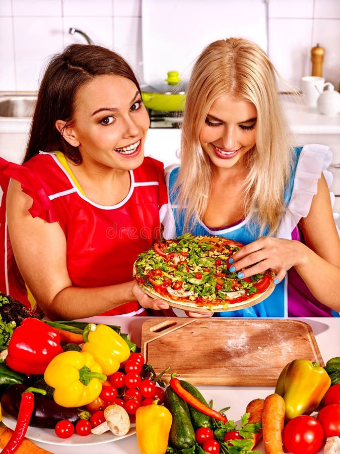 Women cooking pizza stock photo. Image of homemade, face - 56657668