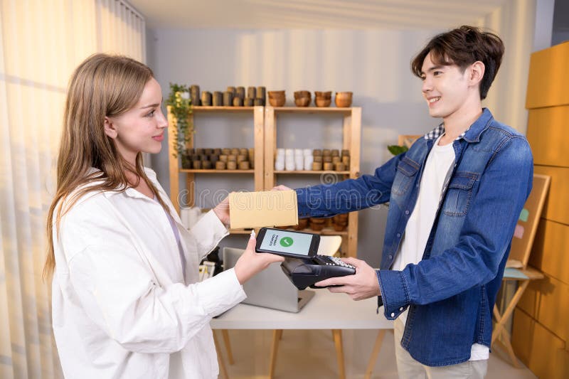 Woman Customer Using QR Code Payment Via Smartphone for Paying at Shop ...