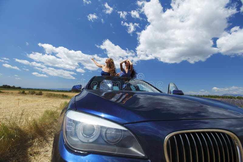 Women dance in car stock image. Image of nature, smile - 27621467