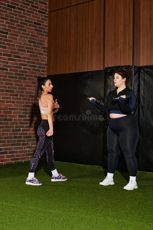 Two Women Engaged in a Dynamic Stock Photo - Image of performance ...