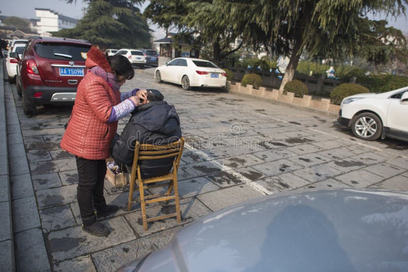 Women dig ear wax editorial stock photo. Image of winter - 73685533