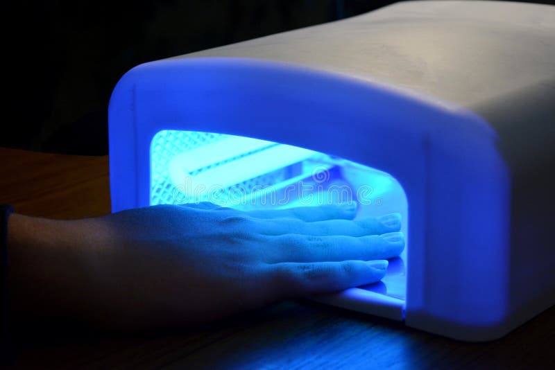 Women Does a Manicure, Shellac, Ultraviolet Lamp Stock Photo - Image of ...