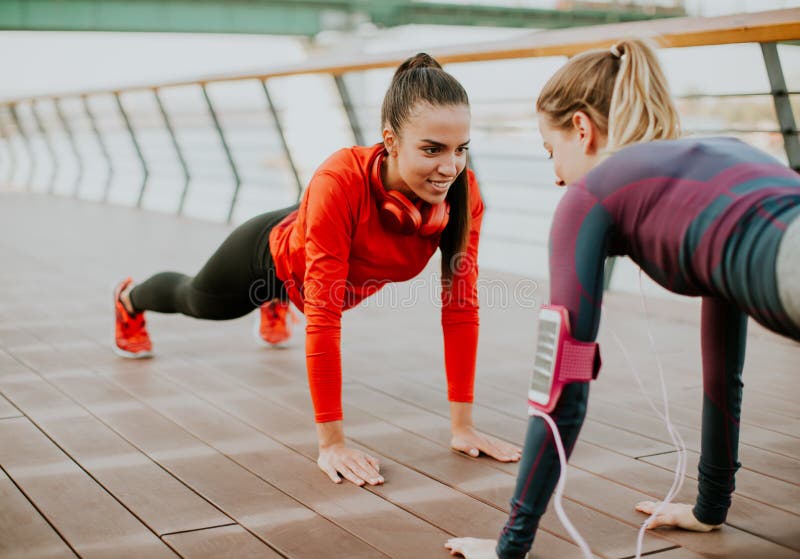 Women Doing Plank on Riverside Stock Photo - Image of lifestyle, floor ...