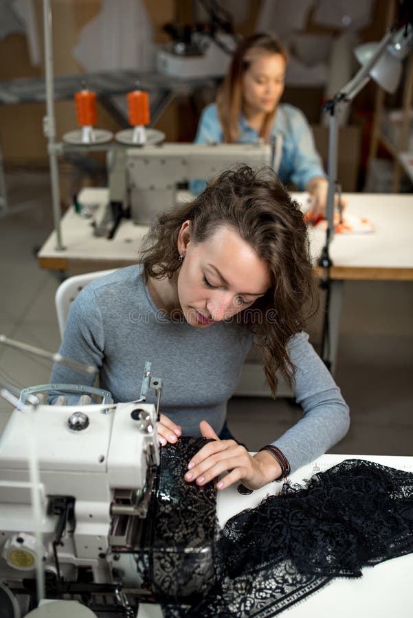 Women Dressmakers Work on Sewing Machines Stock Photo - Image of ...