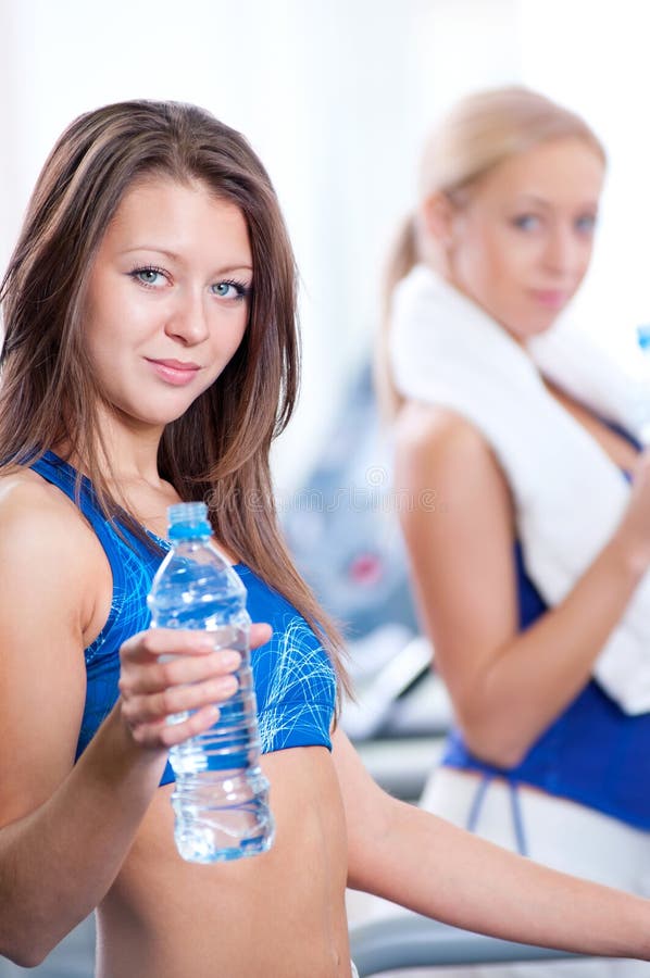 Women Drinking Water after Sports Stock Image - Image of indoors, club ...
