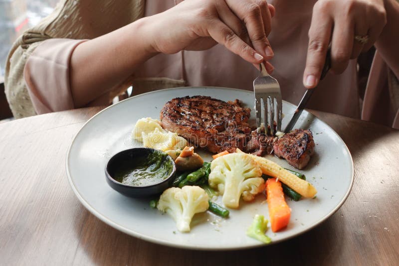 Women Eating Beef Steaks Meat Stock Photo - Image of salad, natural ...