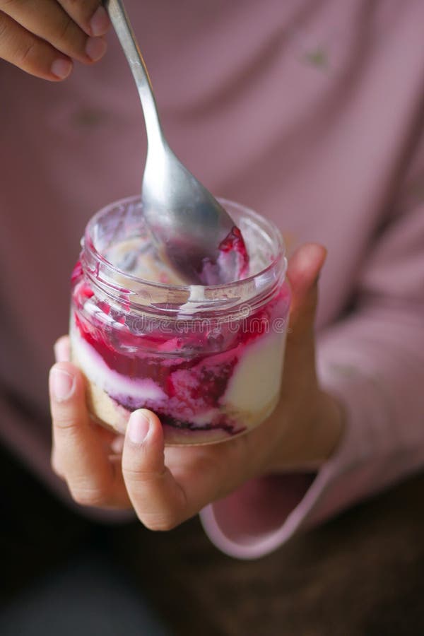 Women Eating Chocolate Pudding in a Glass Jar Stock Image - Image of ...
