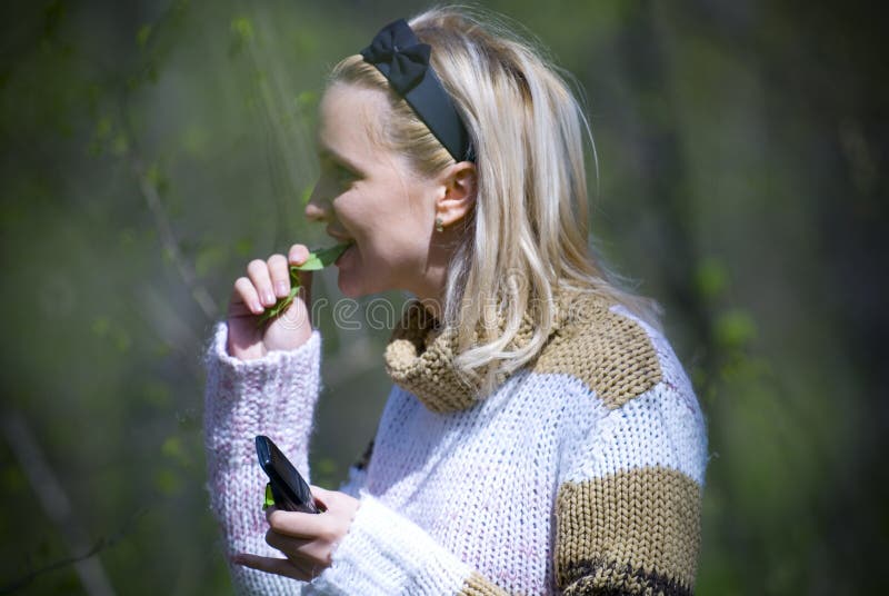 Women eating leaf stock photo. Image of cheerfulness, happiness - 2487086