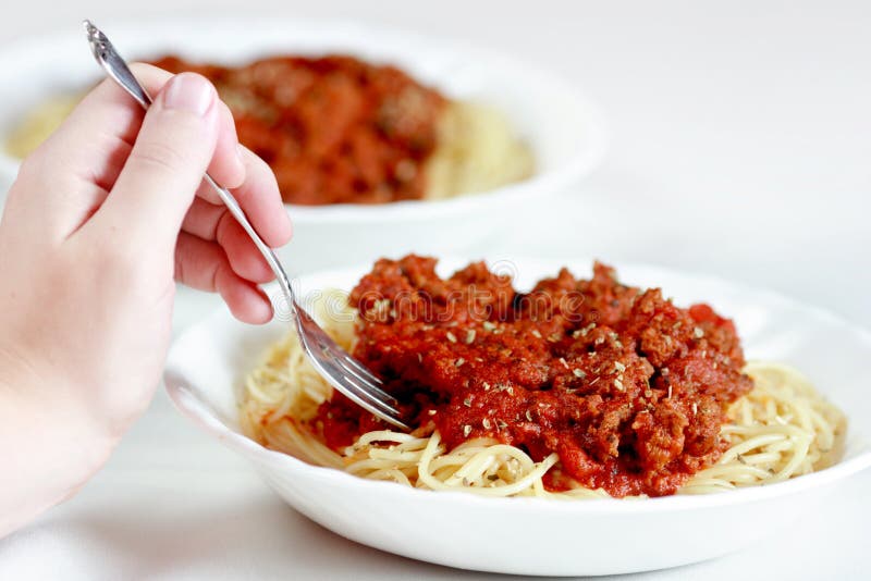 Women eating spaghetti stock photo. Image of carbonara - 5505976