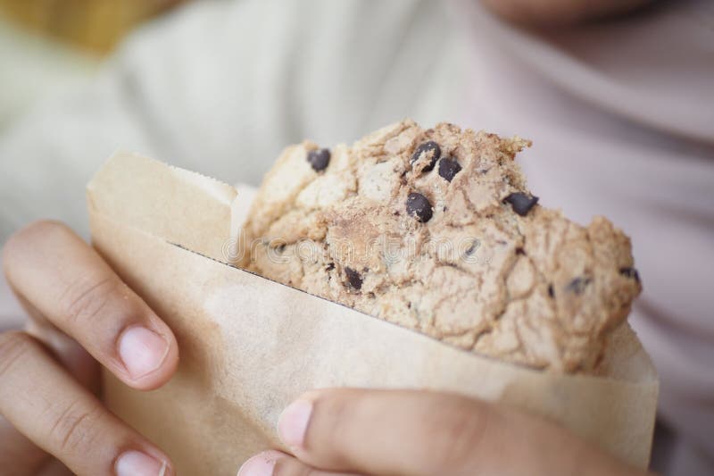 Women Eating a Sweet Cookies Stock Photo - Image of crispy, cream ...
