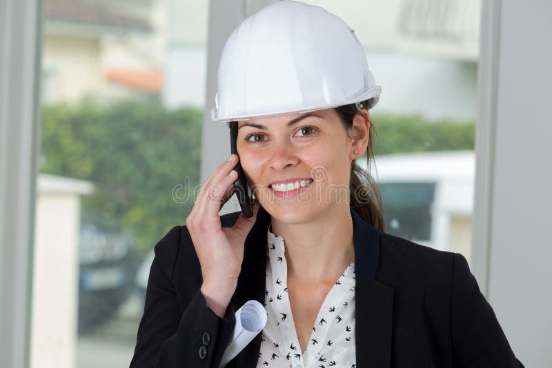 Women engineer on phone stock photo. Image of smartphone - 259237028