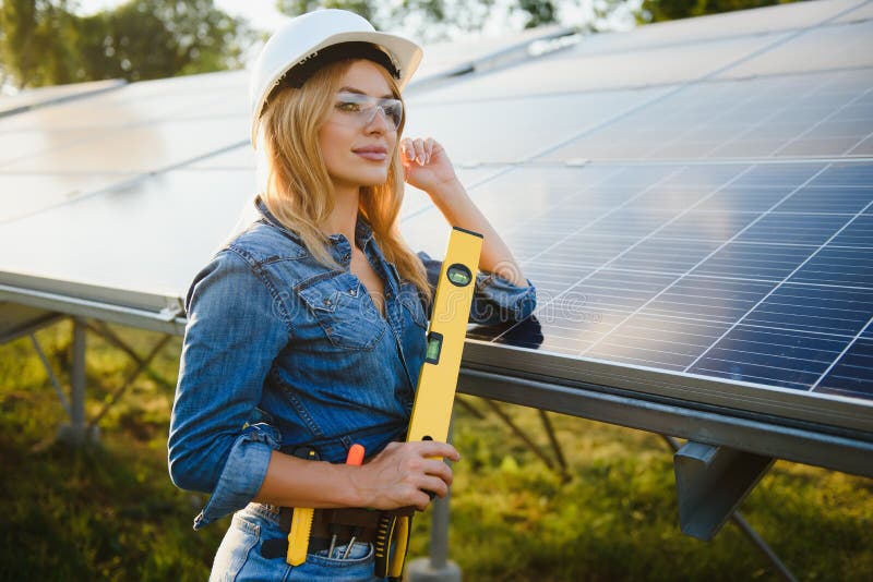 Women Engineer Working on Checking Equipment at Green Energy Solar ...