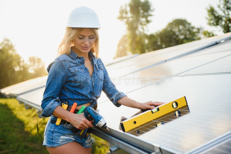 Women Engineer Working on Checking Equipment at Green Energy Solar ...