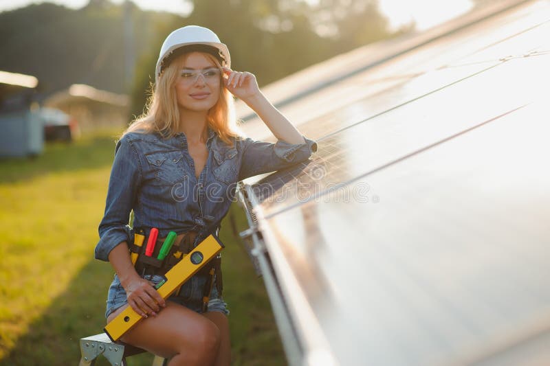 Women Engineer Working on Checking Equipment at Green Energy Solar ...