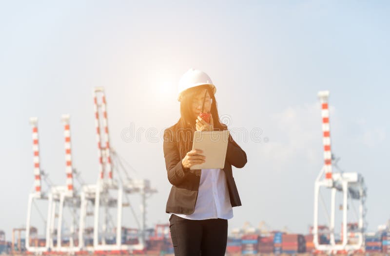 The Women Engineer Working with Container Cargo Freight Ship Stock ...