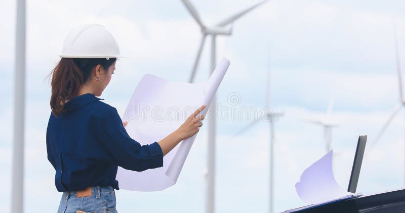 Women Engineer Working on Site at Wind Turbine Farm Stock Photo - Image ...