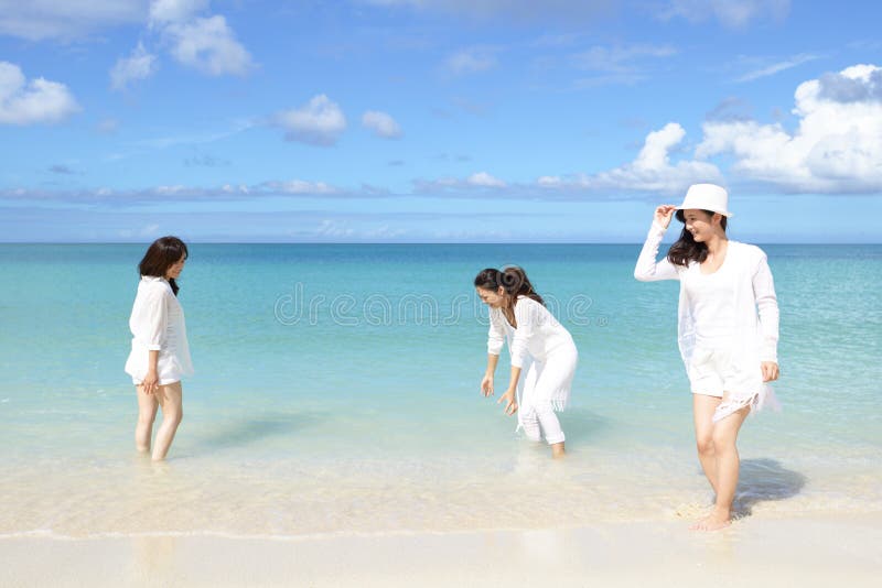 Women enjoy the sun stock photo. Image of pacific, friend - 112477060
