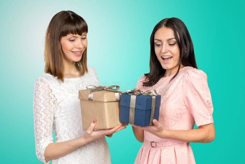 Women exchanging gifts stock photo. Image of appetite - 72927912