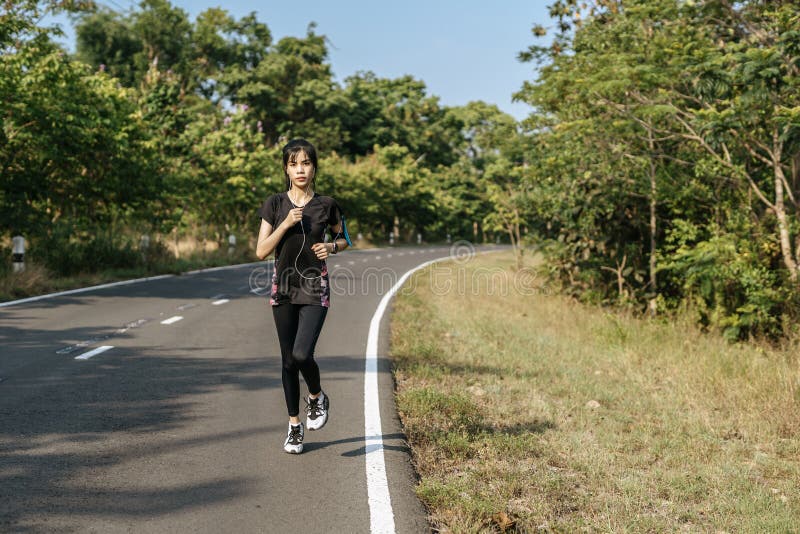 Women Exercise by Running on the Road Stock Photo - Image of healthy ...